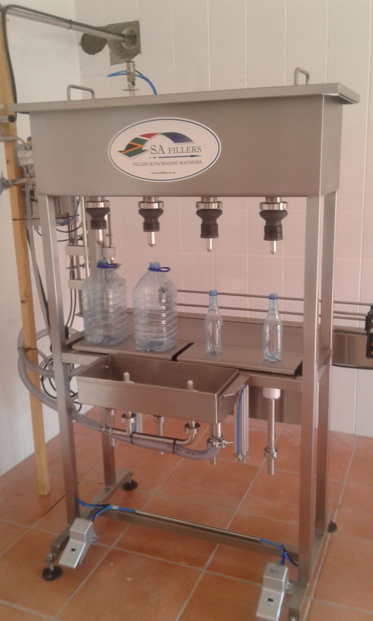 4 Head Lifting Table Gravity Filler - SA Fillers